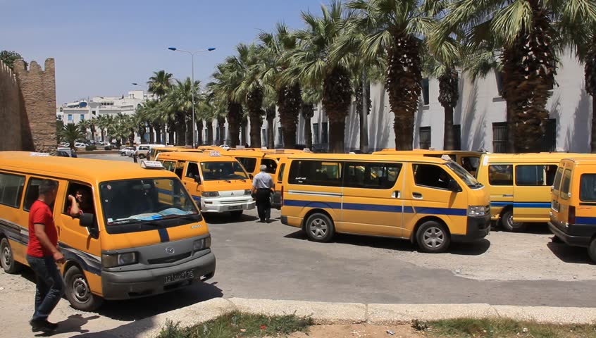 TUNISIA, SOUSSE, JULY 9, 2010: Yellow Minibus And Taxi On Bus Station ...