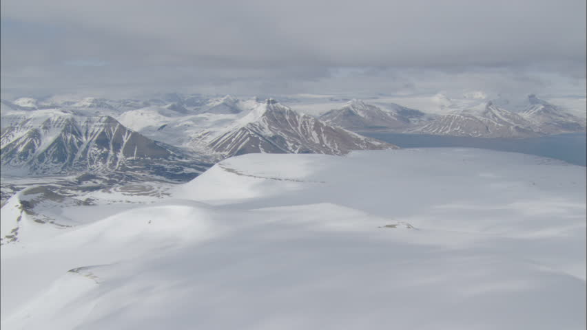 Polar Rocky Mountains Snow. A Scenic View Of A Polar Region. White Snow ...