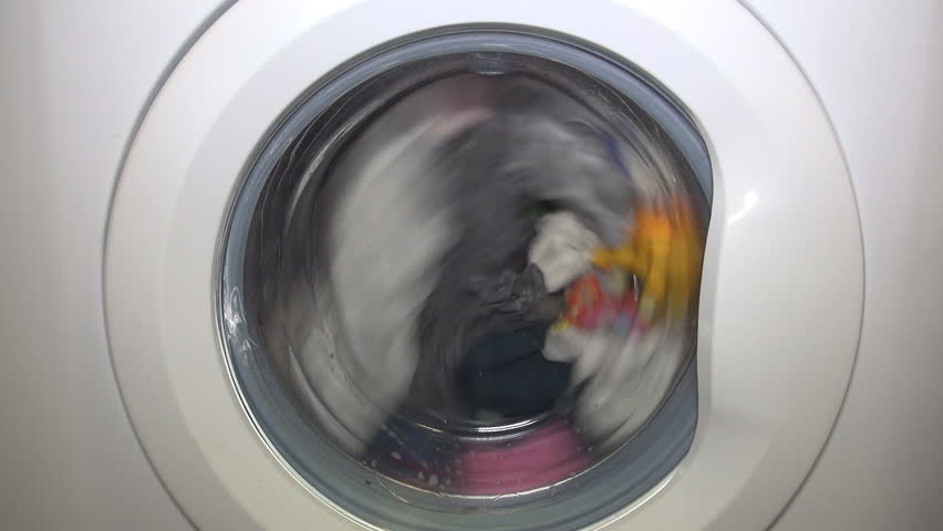 Circular Door Of White Washing Machine Running And Turning With Colored ...
