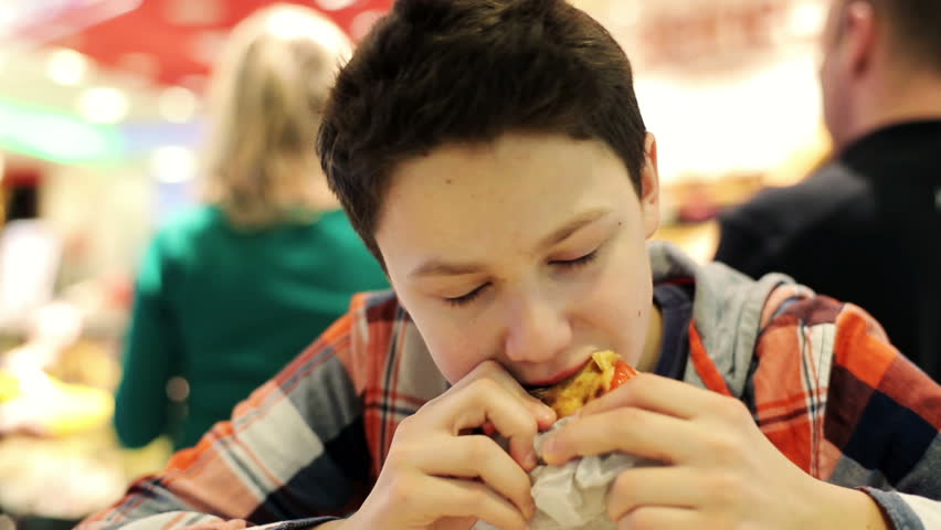Young People Eating Sandwiches And Drinking Juice, Have Picnic On A ...