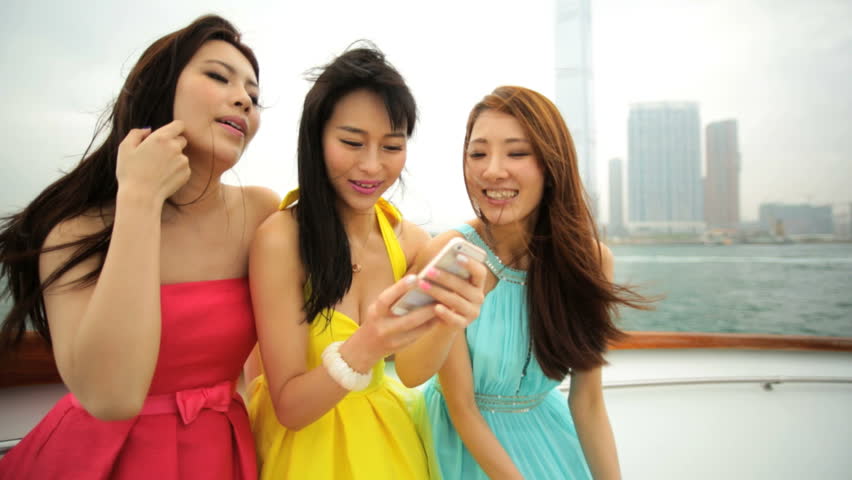 Stock Video Clip of American Asian Chinese three attractive successful ...