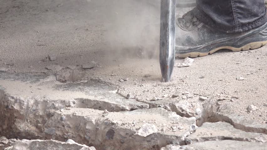 คลิปวิดีโอสต็อกของ Building demolition jack hammer drill breaking ...