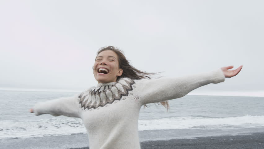 Freedom - Happy Woman On Iceland Dancing Of Joy In Icelandic Sweater On ...