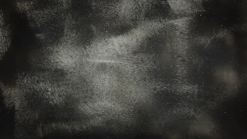 Dust Cloud Seperated Against Black Filling The Frame From Above ...