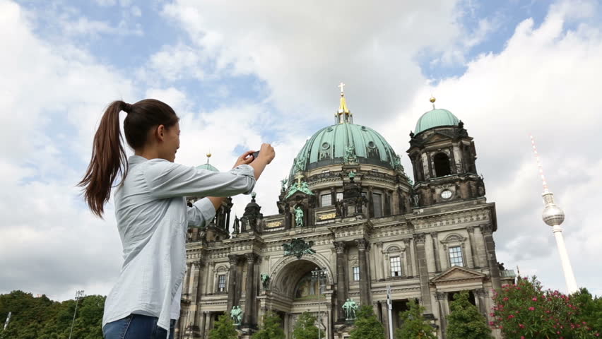 Woman Walking In Berlin, Germany. Casual Girl In Front Of Berlin ...