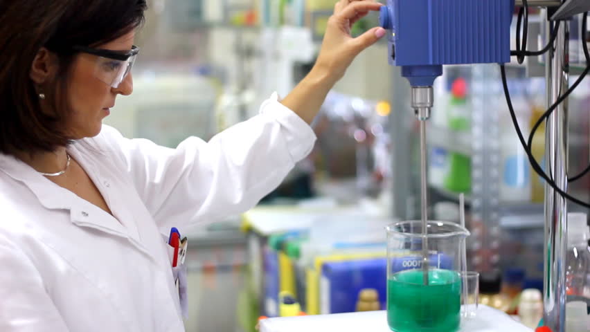 Laboratory Stirrer/Mixer. Chemist Working With Lab Mixer And Mixing ...