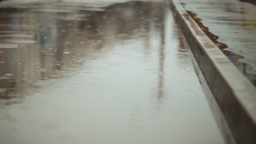 Stock Video Clip of Rain on the street, bad weather. Puddles | Shutterstock
