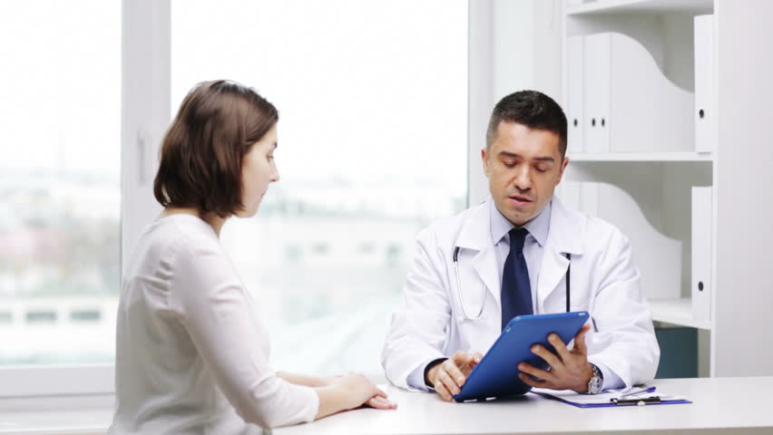 Young Woman At The Chemist's Shop / Chemist Entering Data In The ...