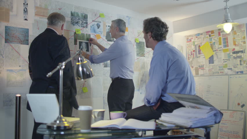 4K Police Detectives Working Together In Incident Room To Try And Solve ...