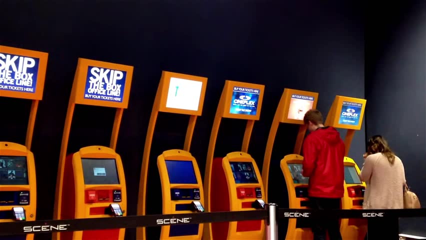 Coquitlam, BC, Canada - February 21, 2017 : People Buying Movie Ticket ...